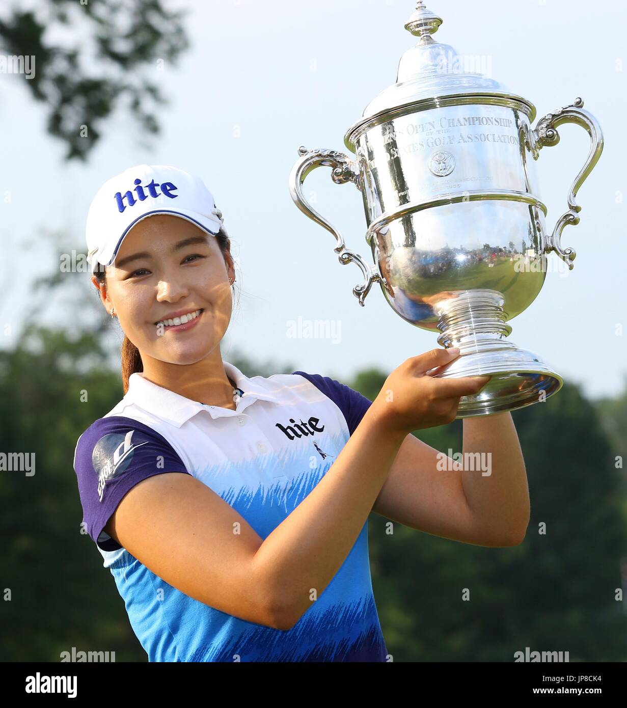 Chun In Gee of South Korea holds up her championship trophy after ...