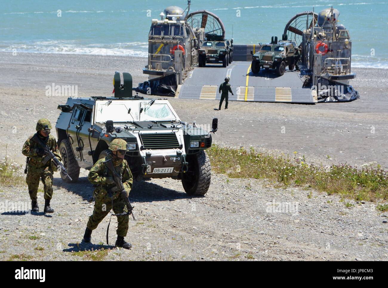 Members of the Japanese Ground Self-Defense Force's 13th Brigade engage ...