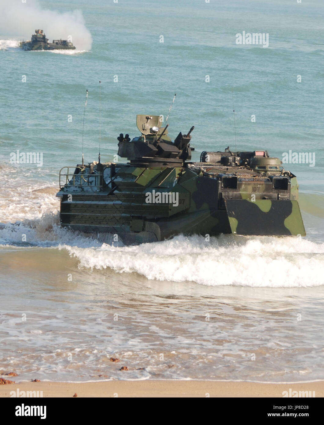 A U.S. military amphibious vehicle approaches the coast during a joint ...