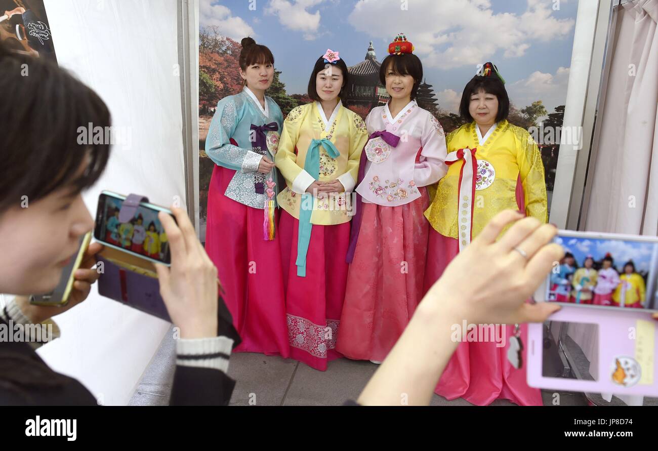 Four young Japanese women clad in traditional Korean "chima chogori ...