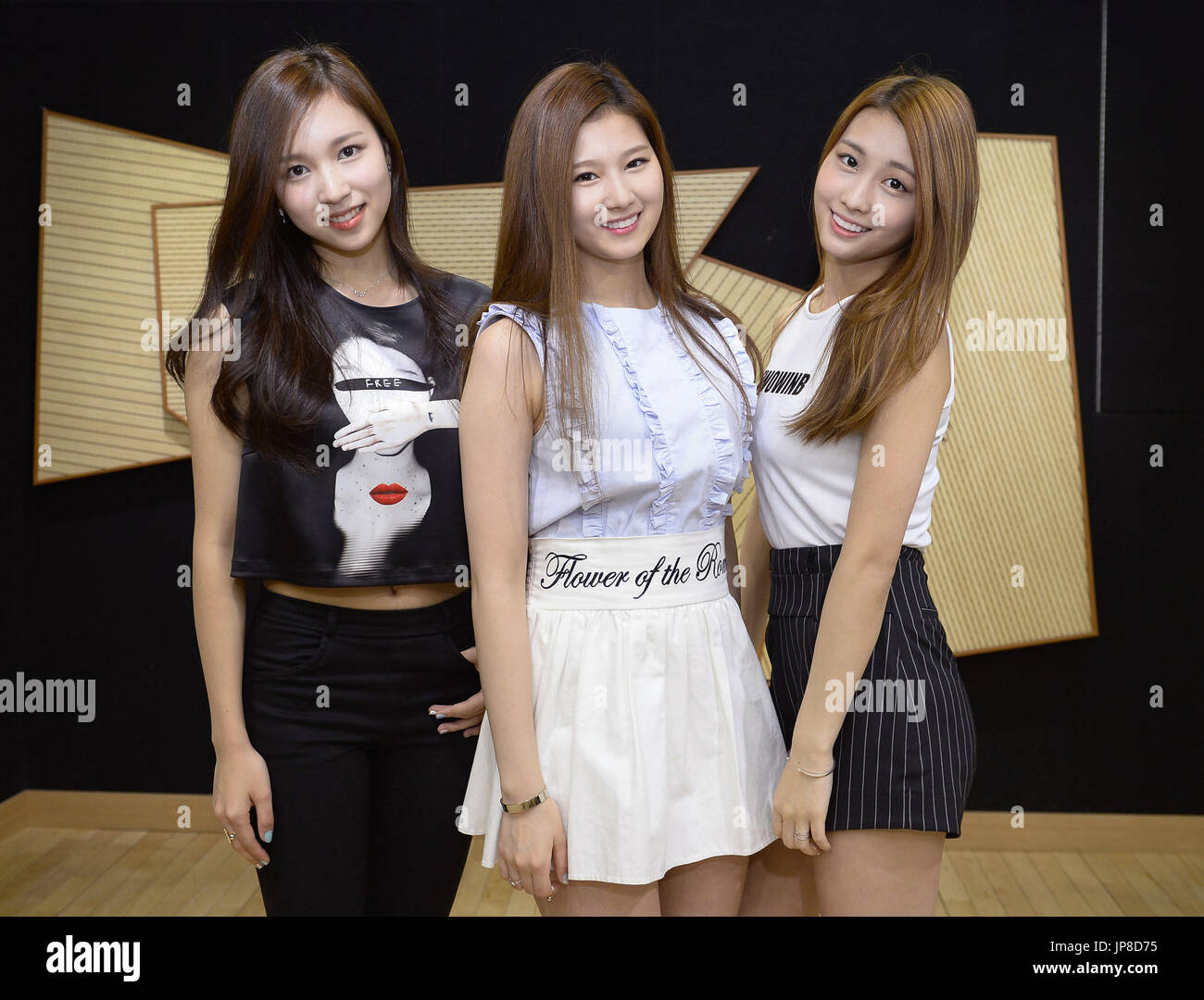 Three young Japanese women being trained as Korean pop music singers ...