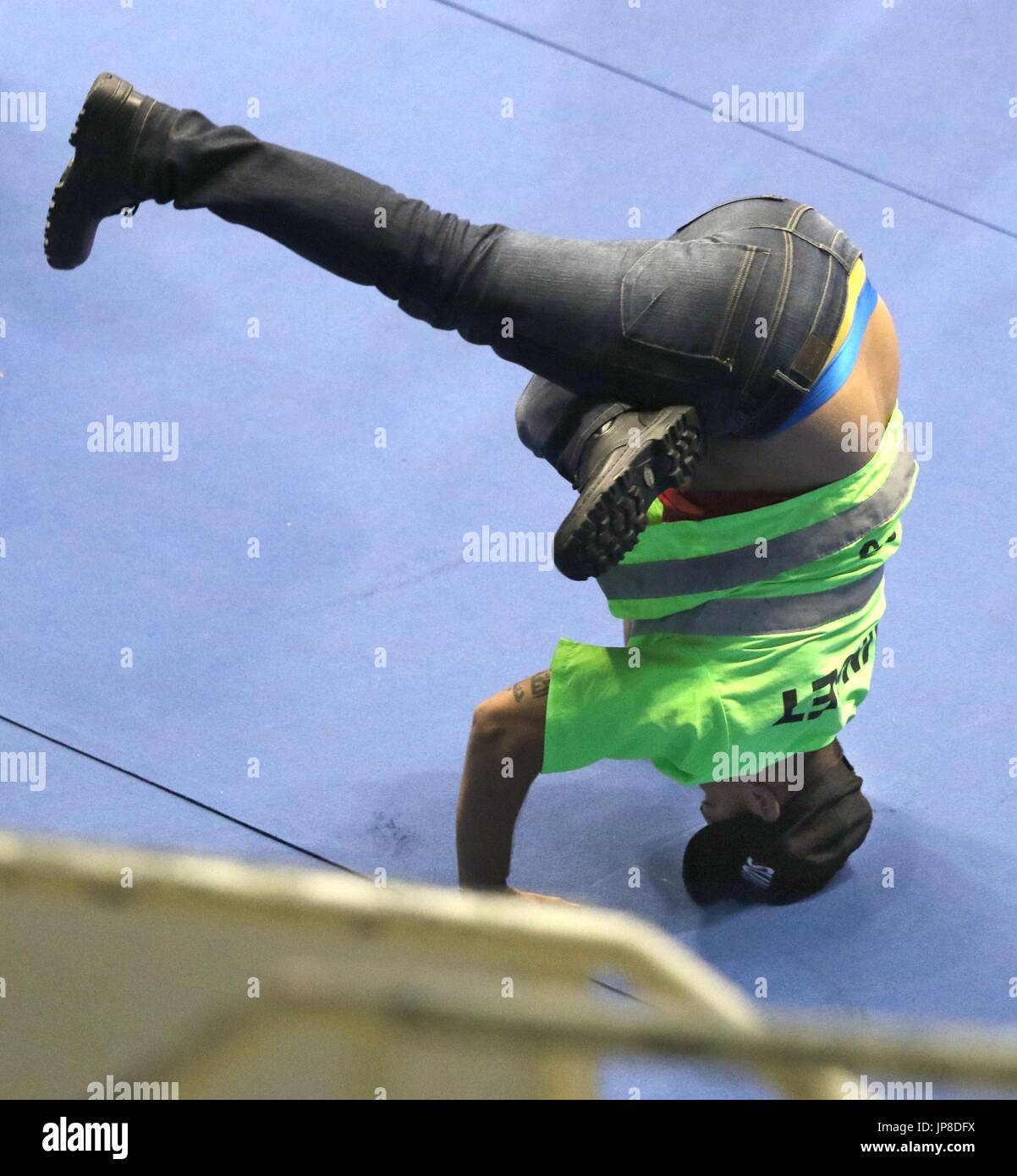 A Brazilian security guard shows his dance moves during a timeout of ...