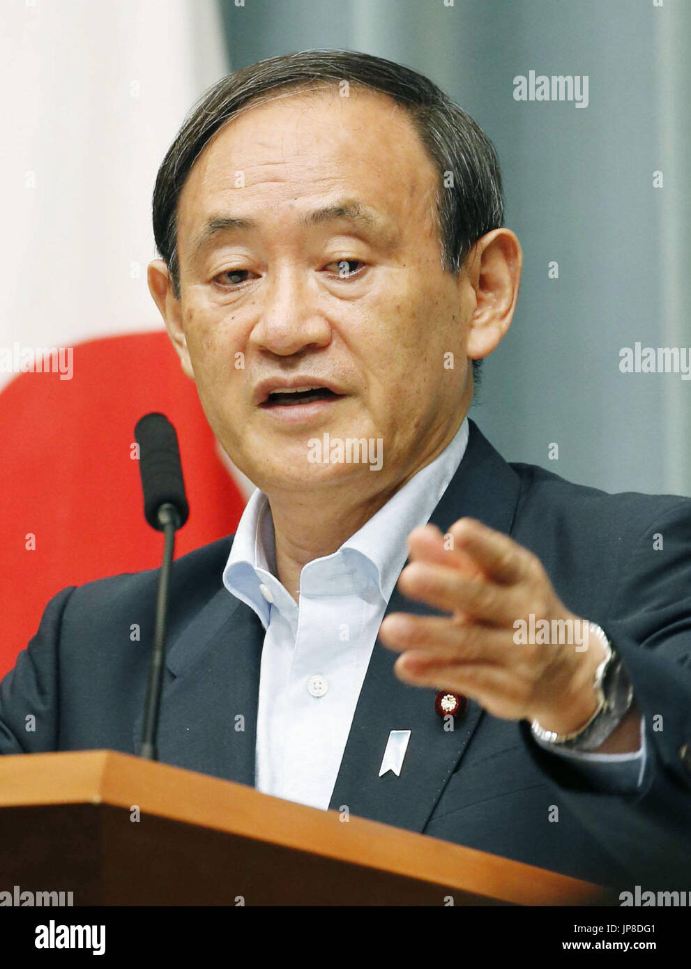 Chief Cabinet Secretary Yoshihide Suga attends a press conference at ...