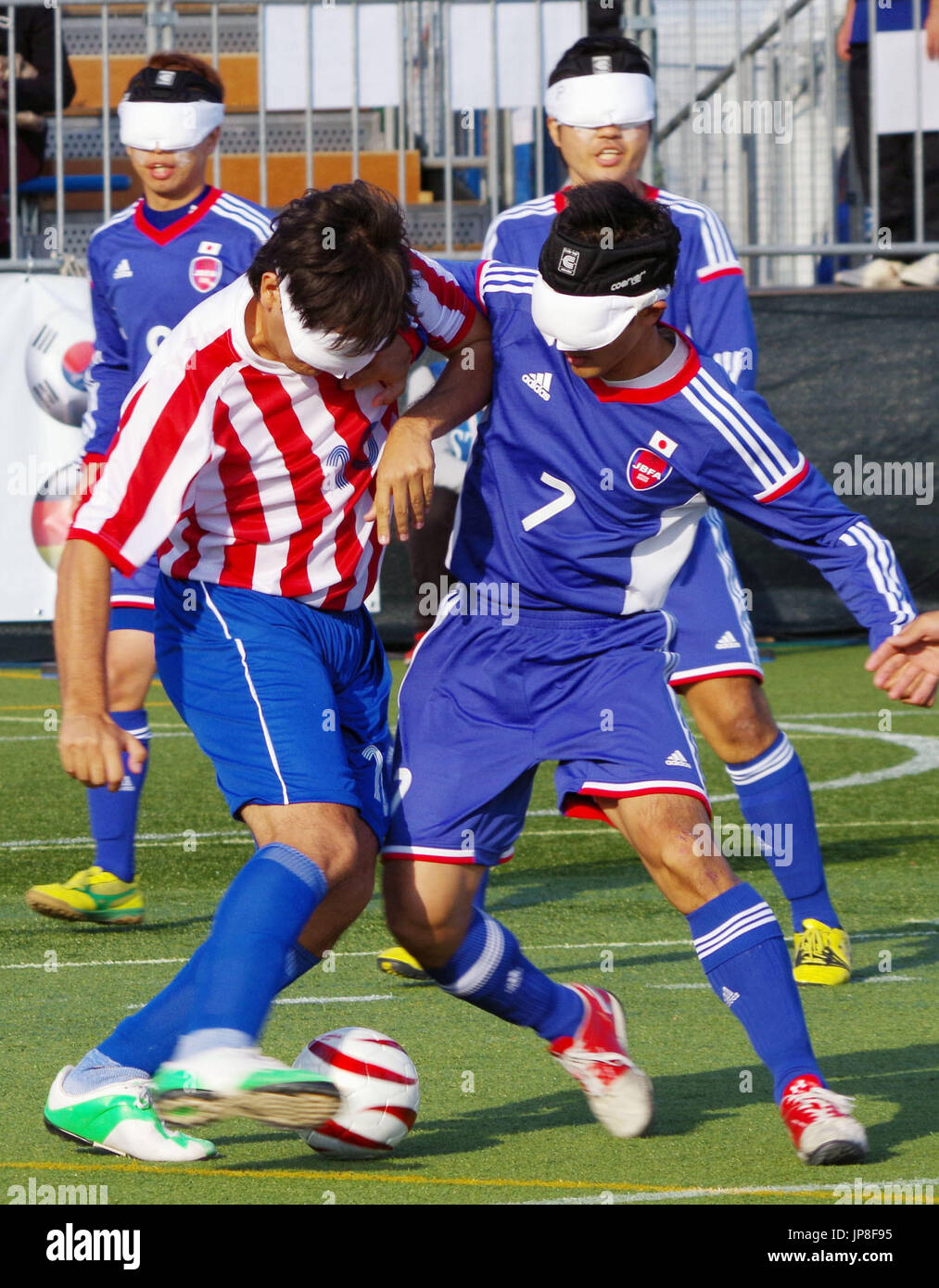 File photo taken in November 2014 shows players with eye masks ...