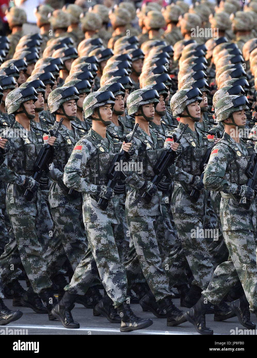 Chinese soldiers march in front of Tiananmen Square in Beijing on Sept ...