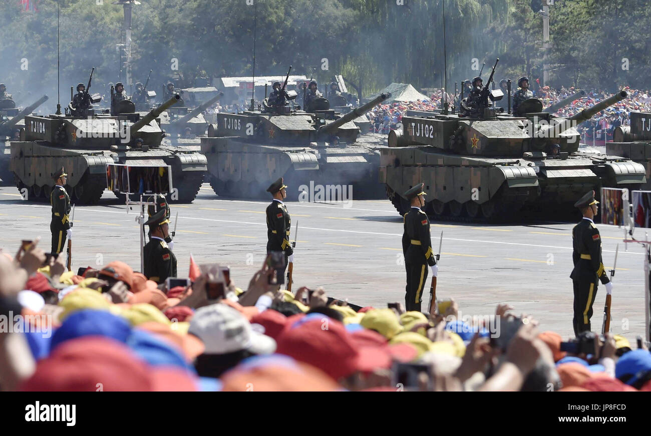 Photo shows Chinese tanks passing through Tiananmen Square in Beijing ...