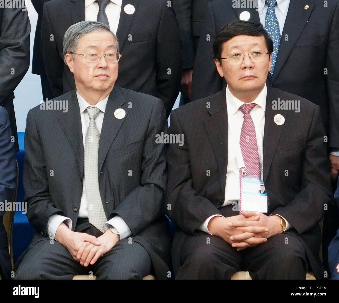 Chinese Finance Minister Lou Jiwei (R) and Zhou Xiaochuan, governor of ...