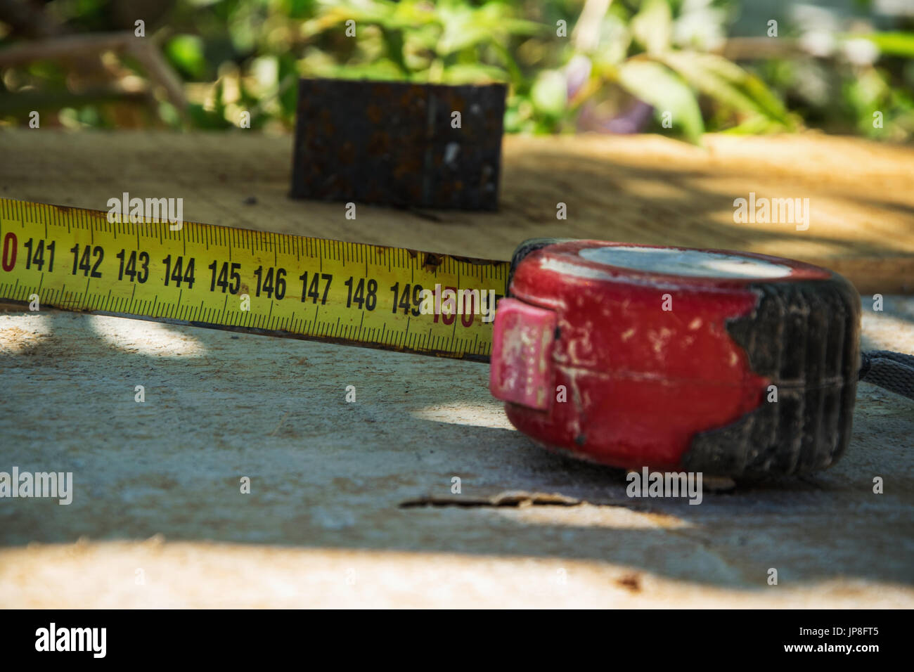 Rolling measuring tape hi-res stock photography and images - Alamy