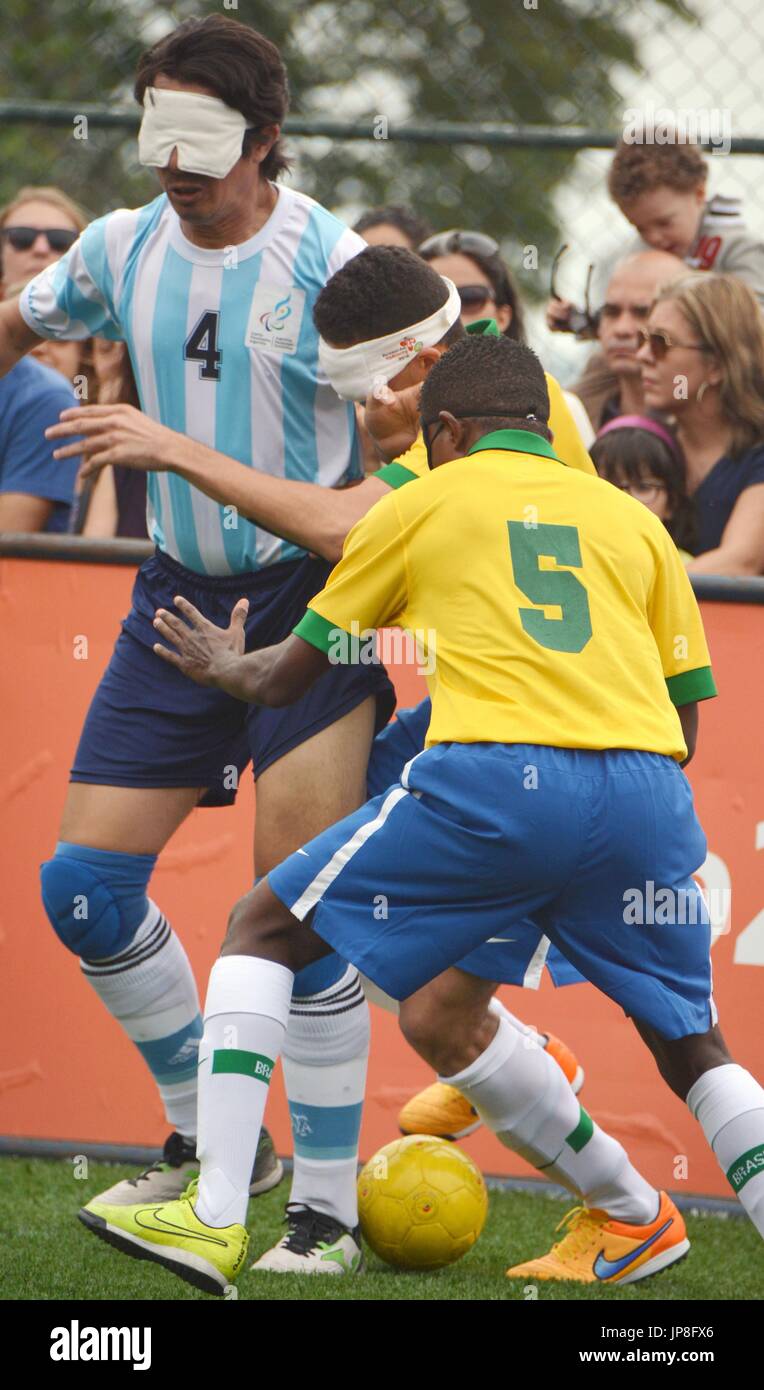 Brazilian and Argentinean blind football players compete in an ...