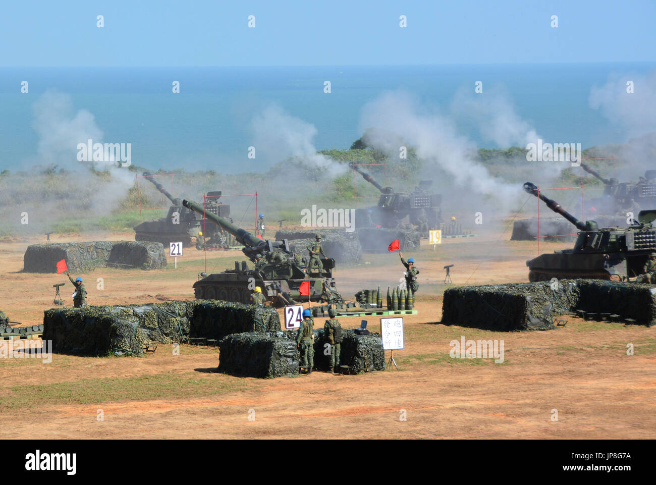Artillery units fire during Taiwan's annual Han Kuang military exercise ...