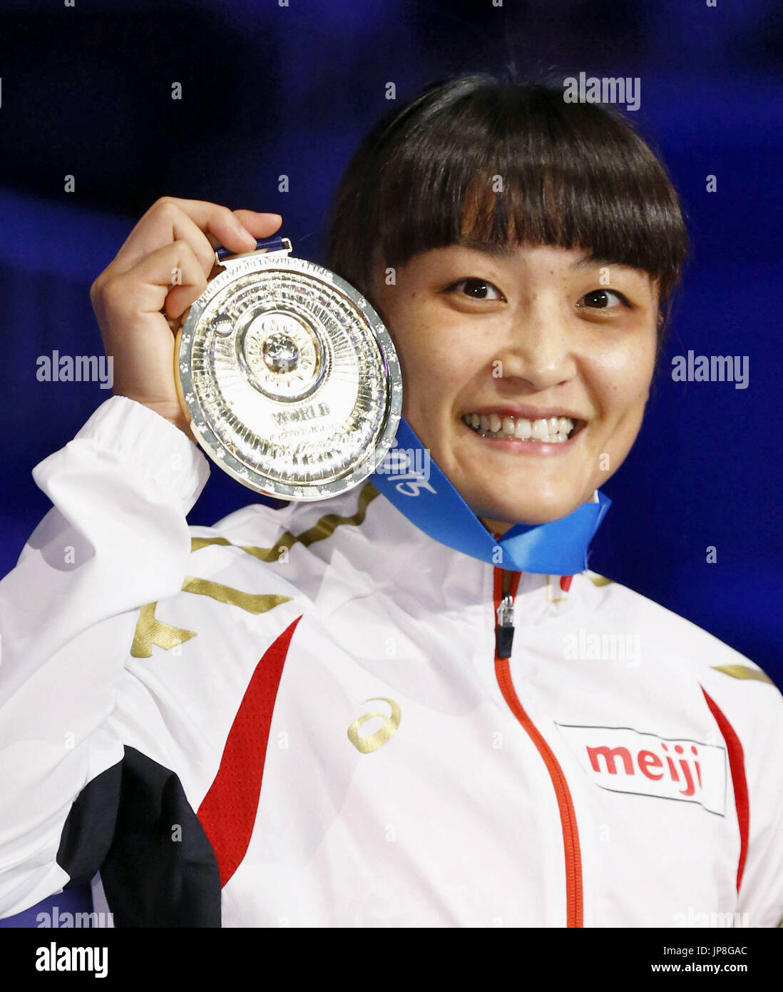 Japan's Kaori Icho smiles with her gold medal after beating Petra Olli ...