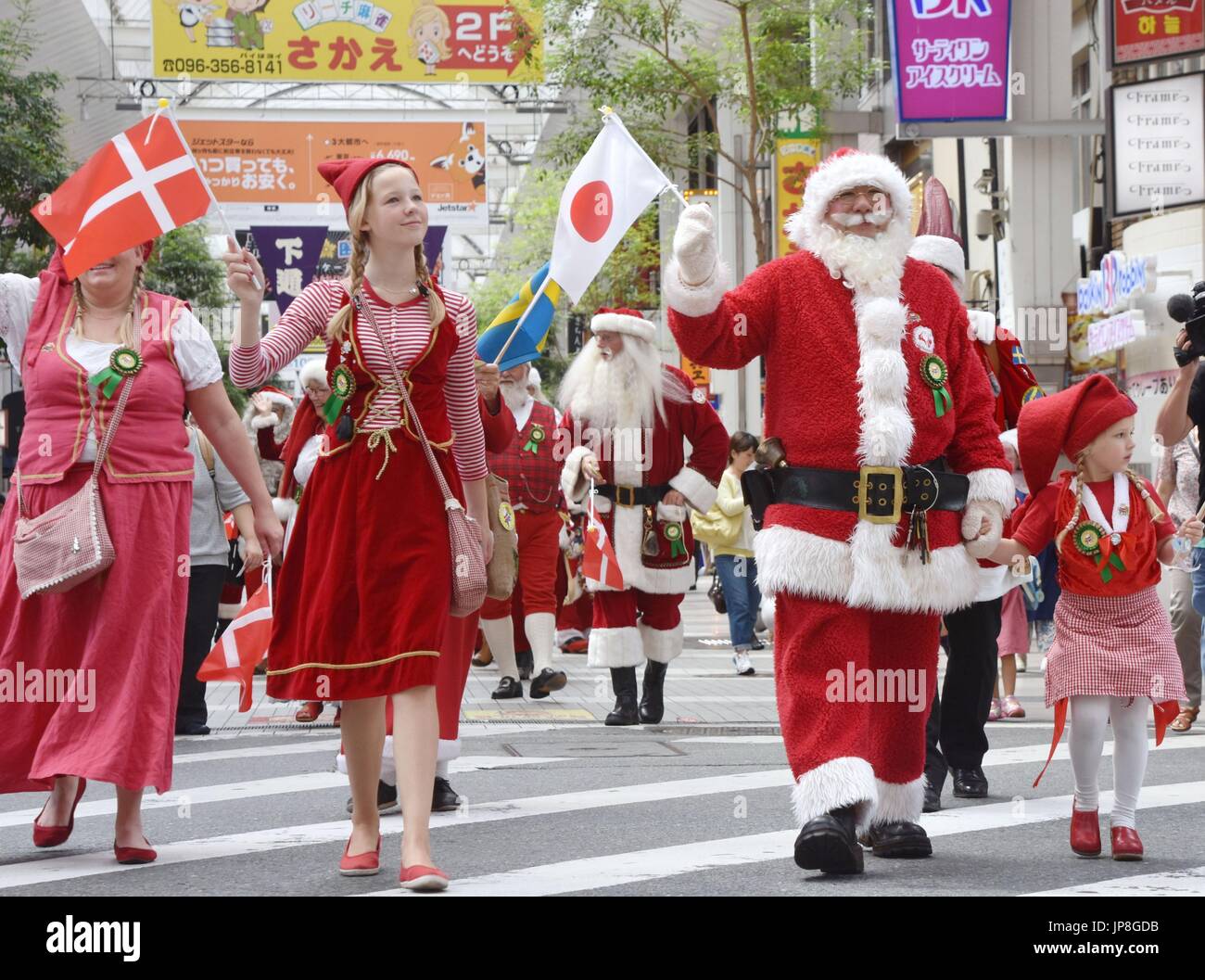 Twenty-two Santa Clauses from around the world parade through the ...
