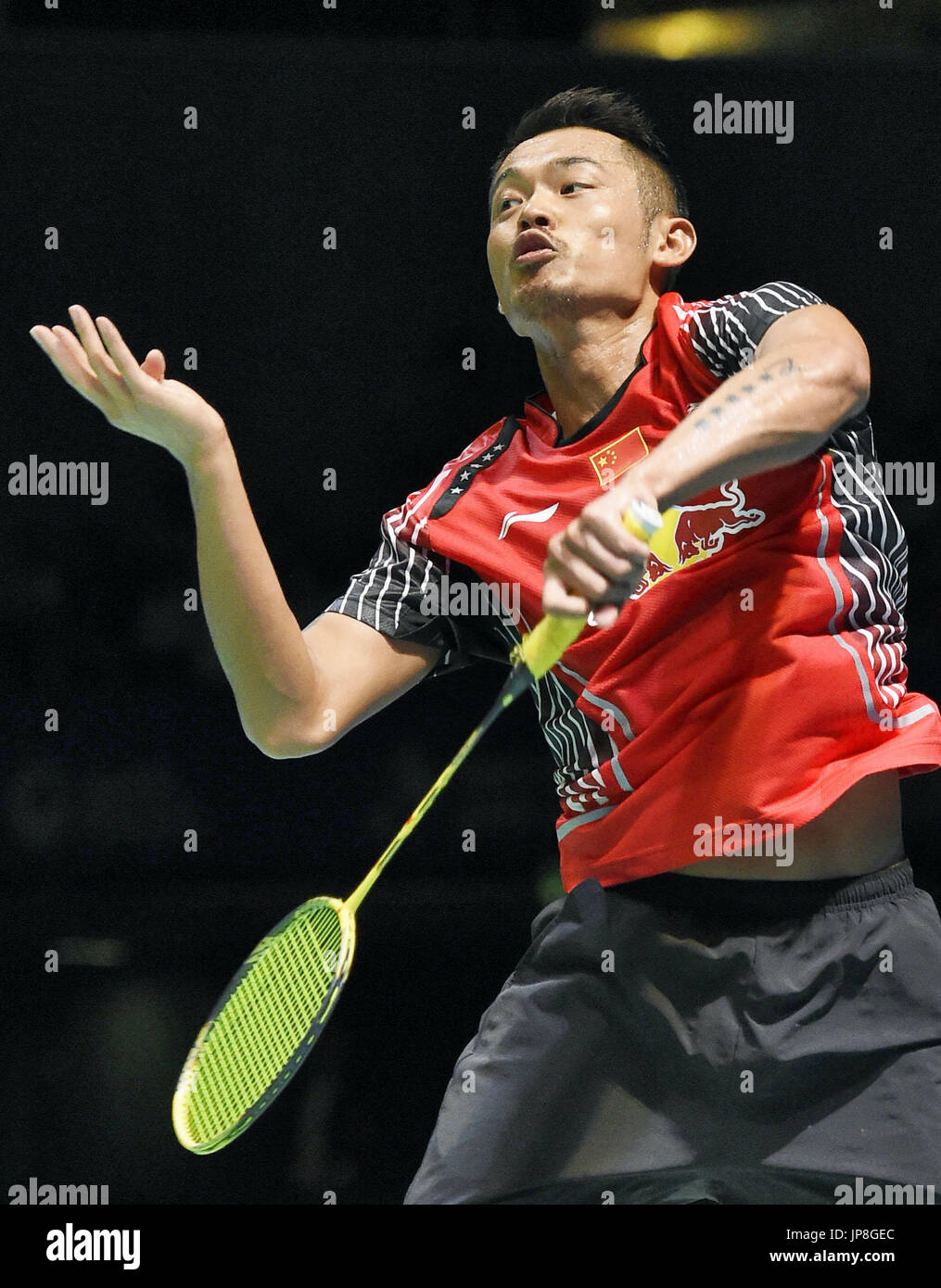 Beijing and London Olympic gold medalist Lin Dan of China plays against ...
