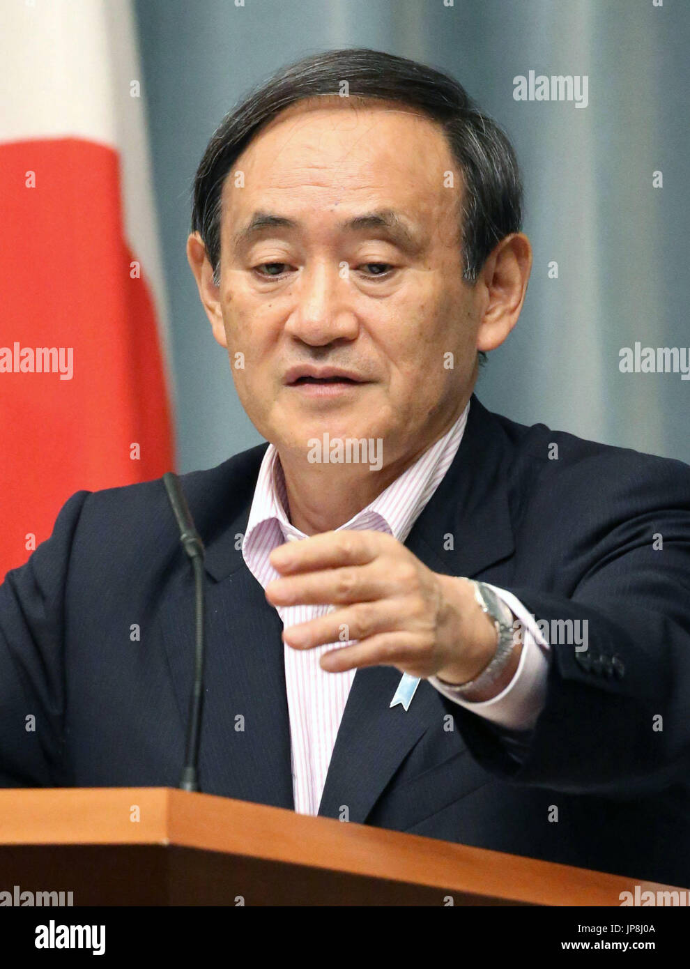 Chief Cabinet Secretary Yoshihide Suga attends a press conference in ...