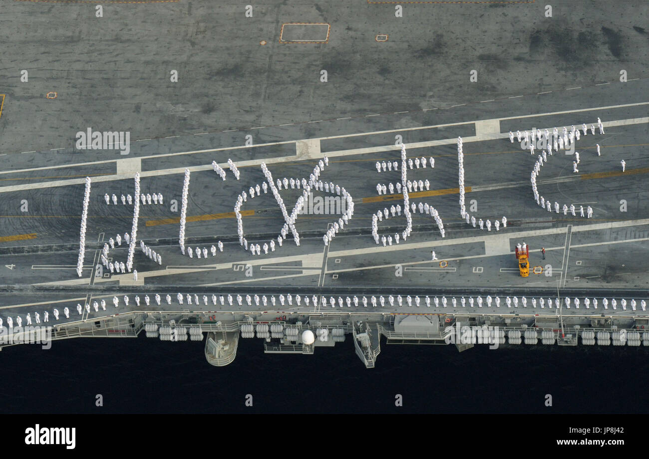 Crew members form Japanese letters "Hajimemashite," meaning "nice to ...