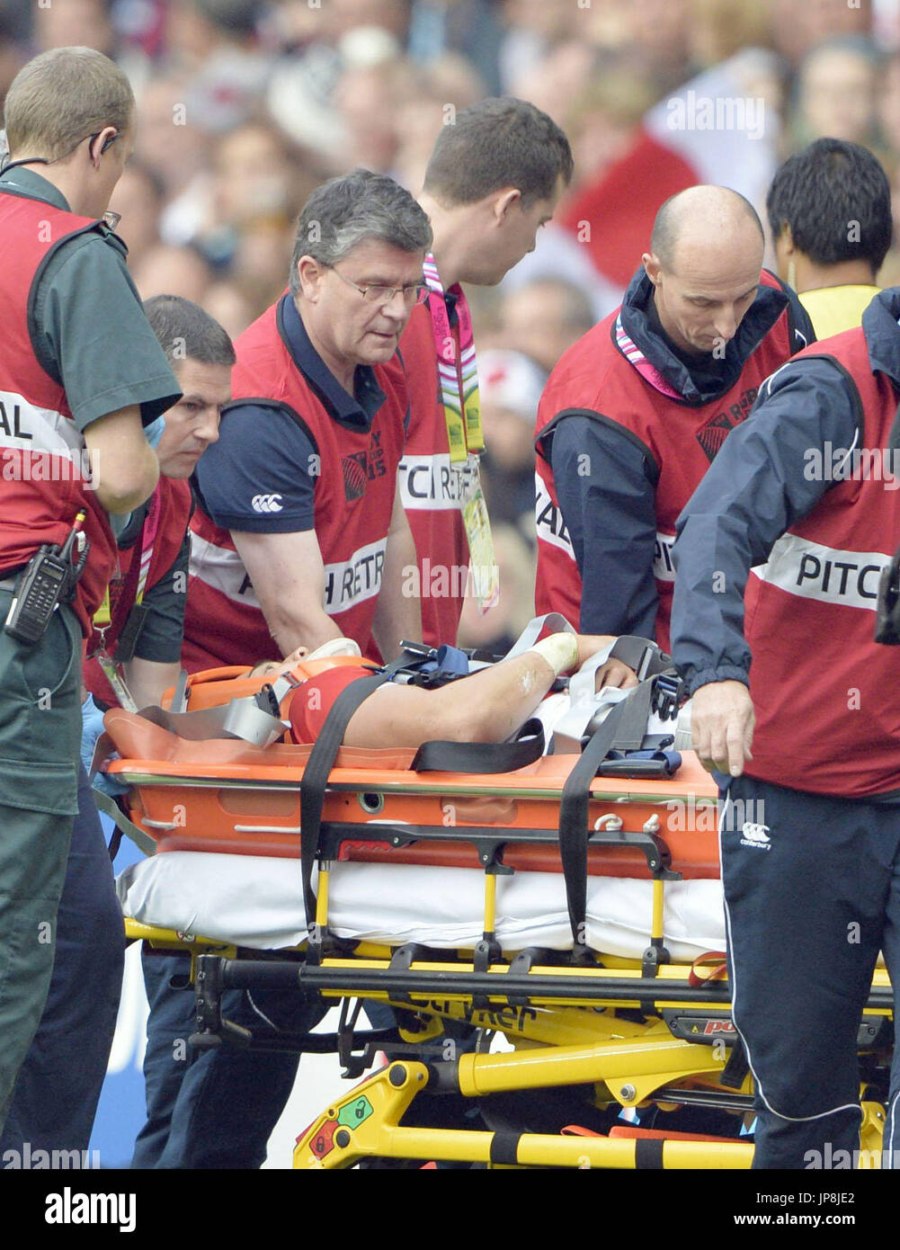 Japan's Akihito Yamada is carried off the field on a stretcher during ...