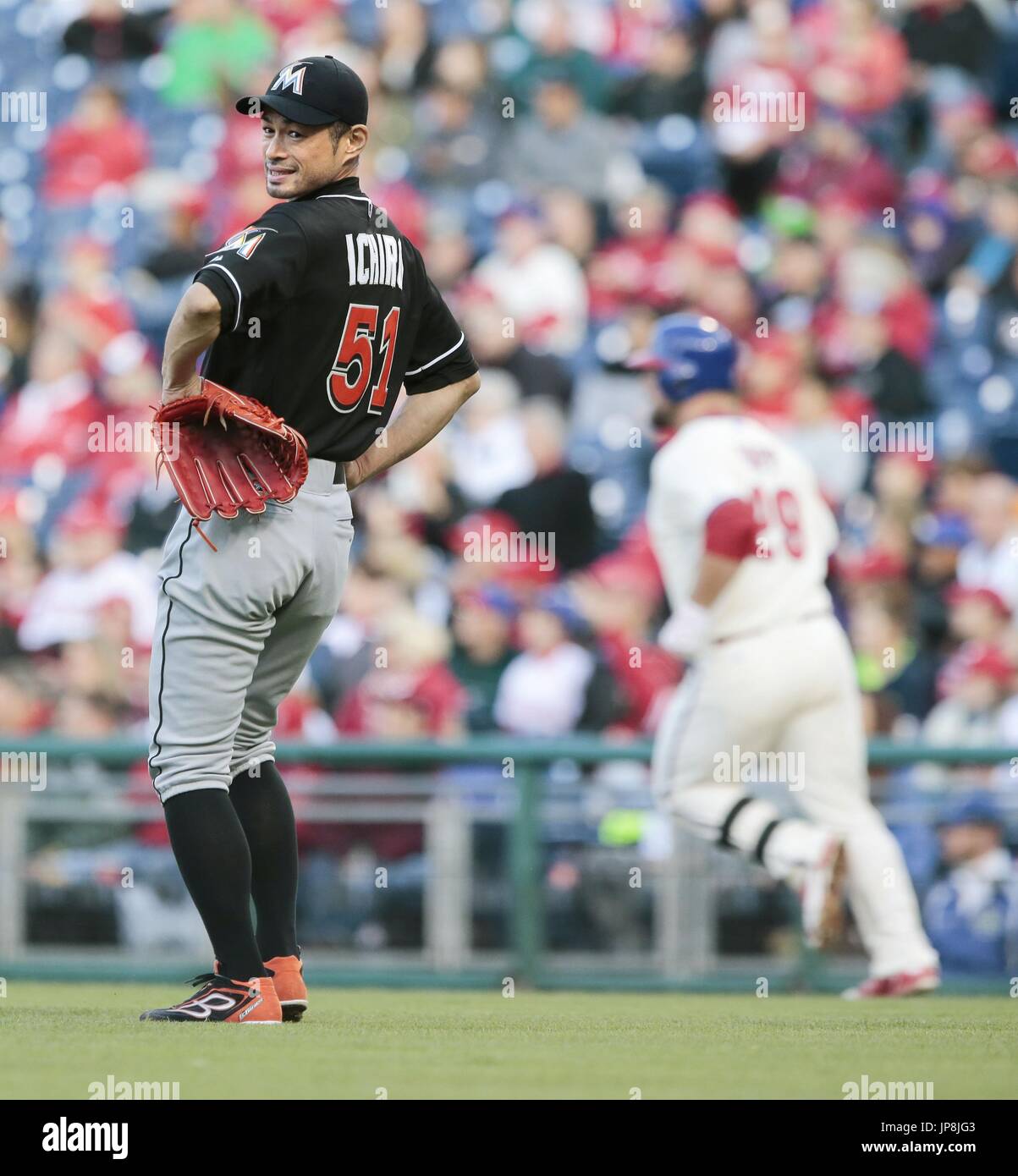 Miami Marlins Ichiro Suzuki smiles as he gets the first out in his ...
