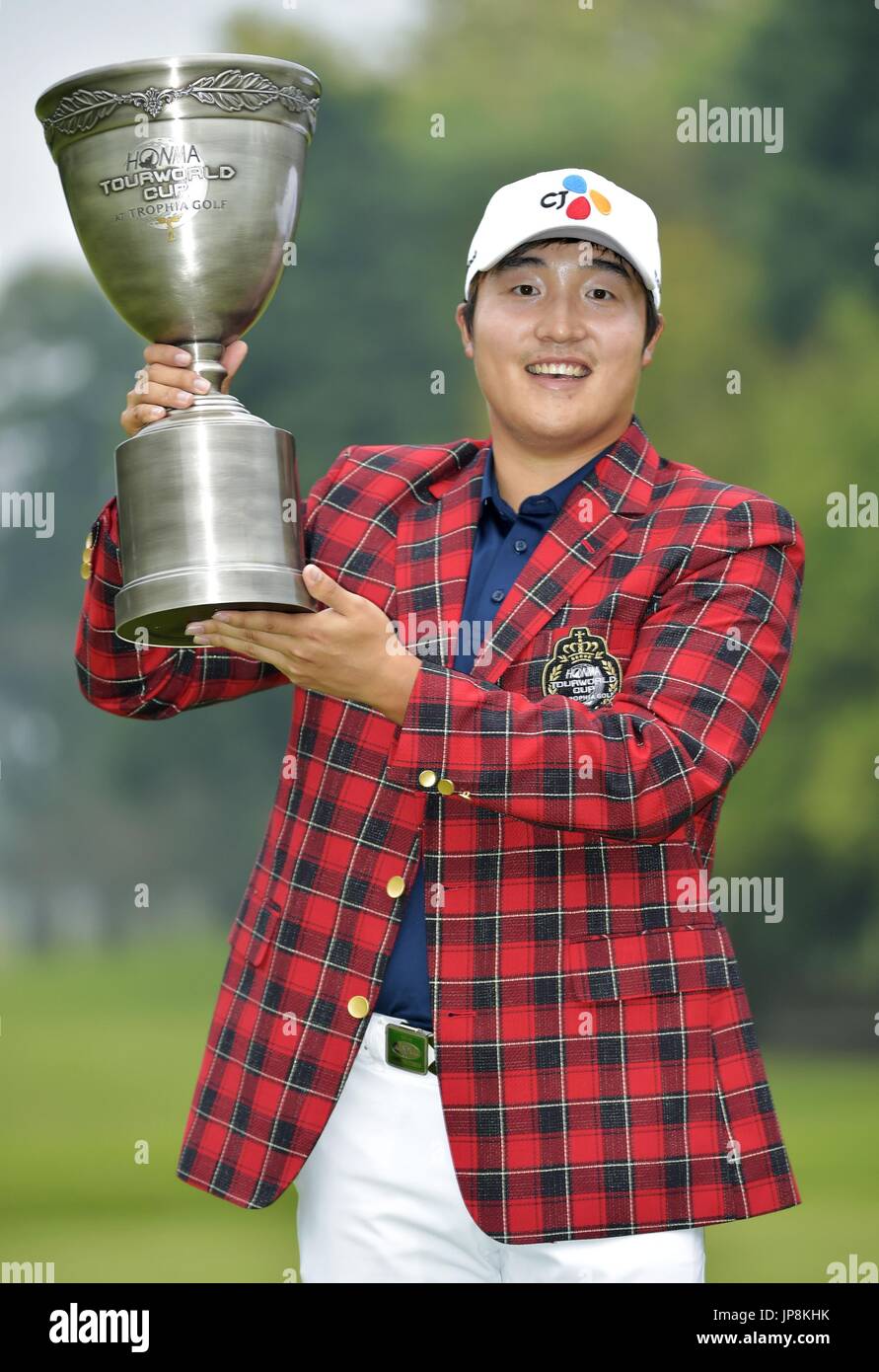 South Korea's Lee Kyoung Hoon poses with a trophy after winning the ...