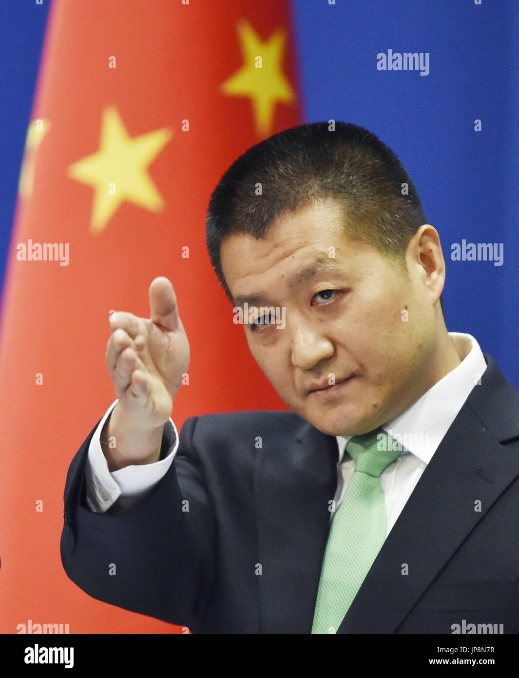 The Chinese Foreign Ministry's top spokesman Lu Kang attends a press ...