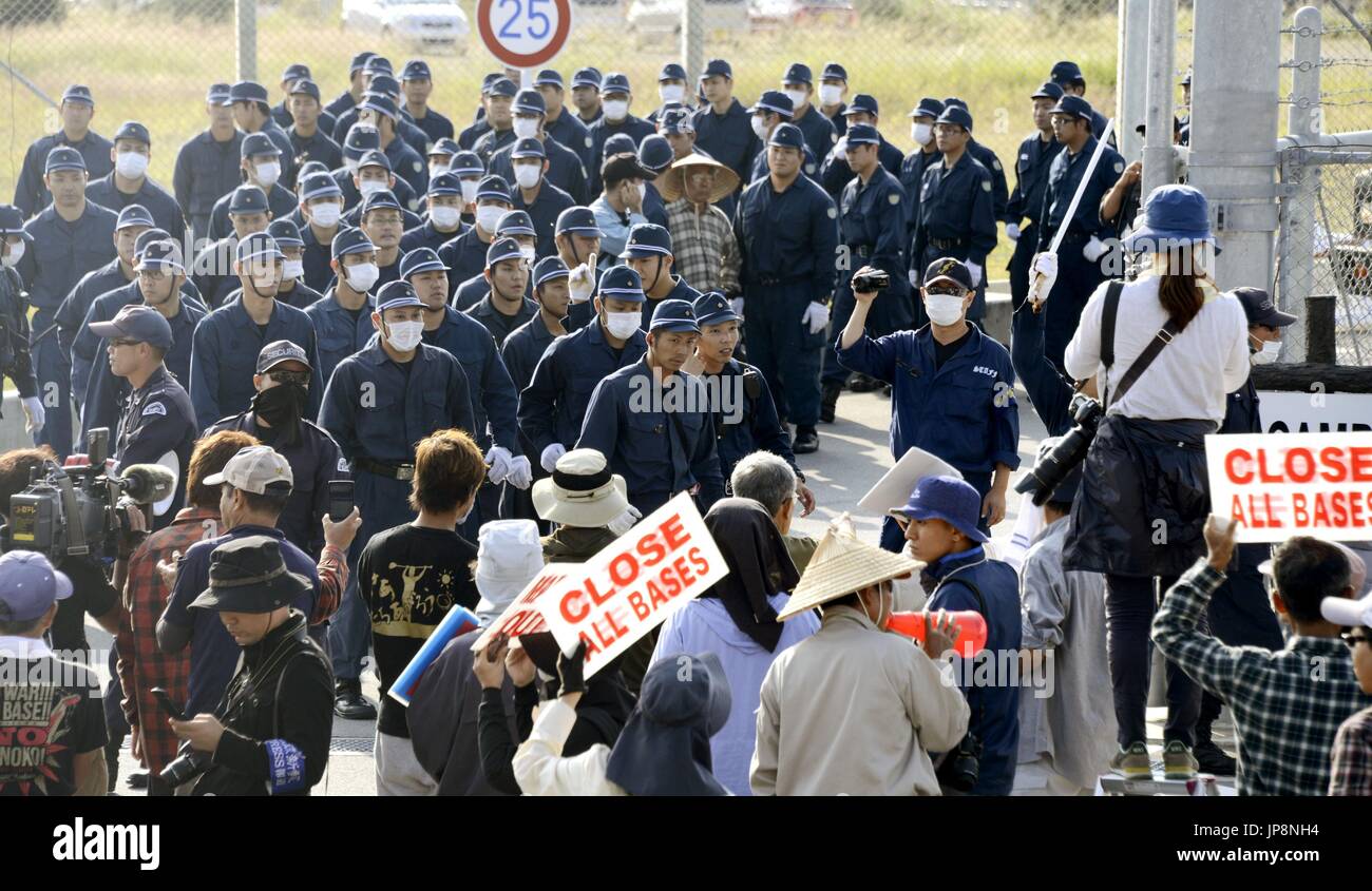 Police officers stand guard at the front gate of the U.S. Marine Corps ...