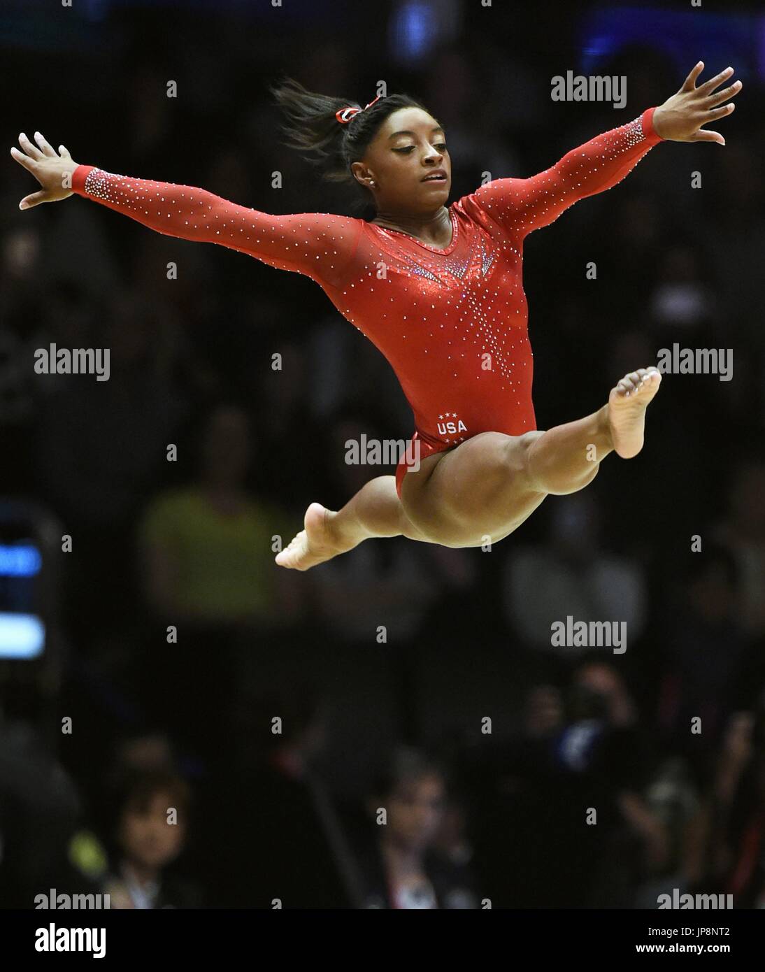 Simone Biles of the United States performs the floor exercise portion ...