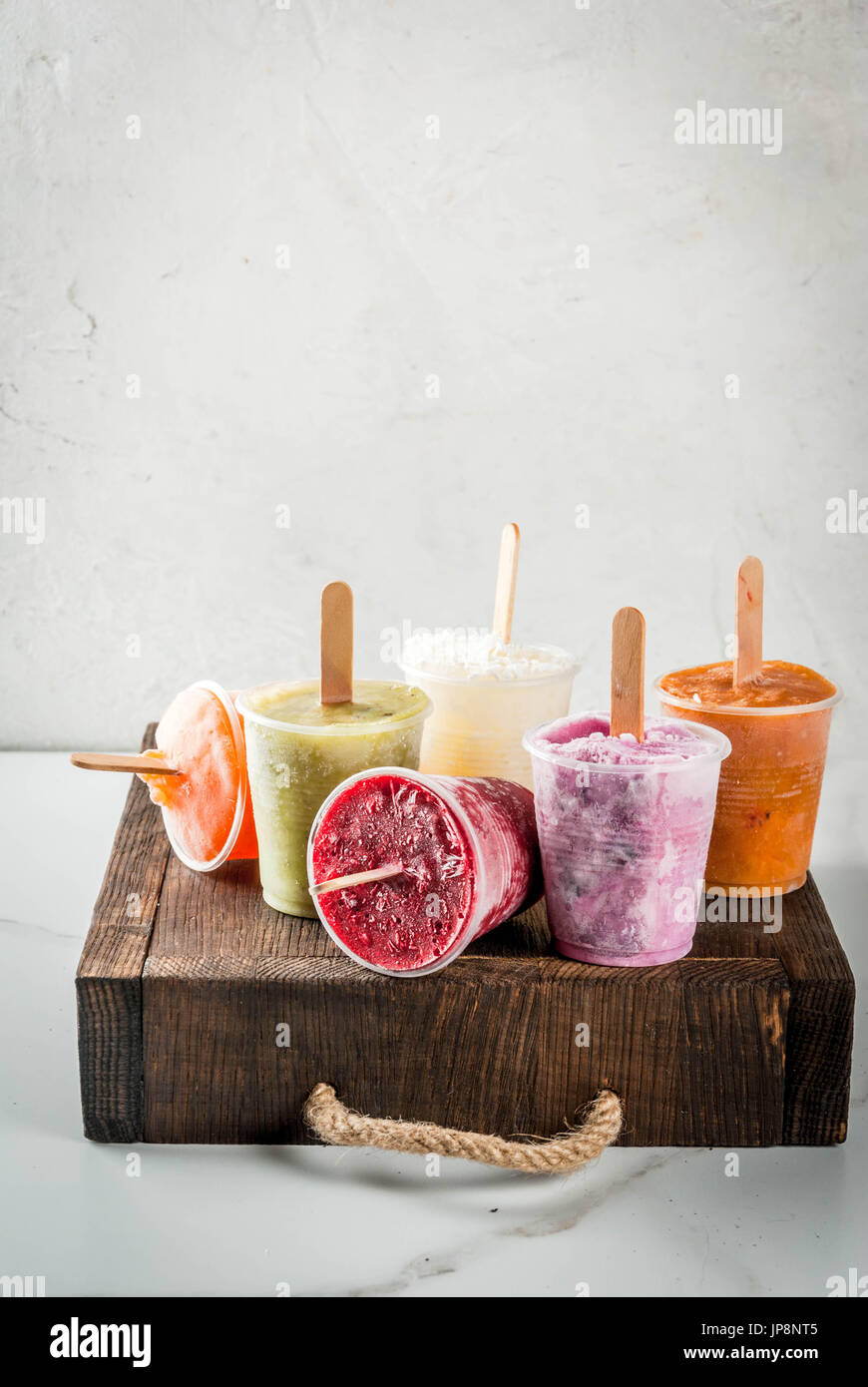 Healthy summer desserts. Ice cream popsicles. Frozen tropical juices ...