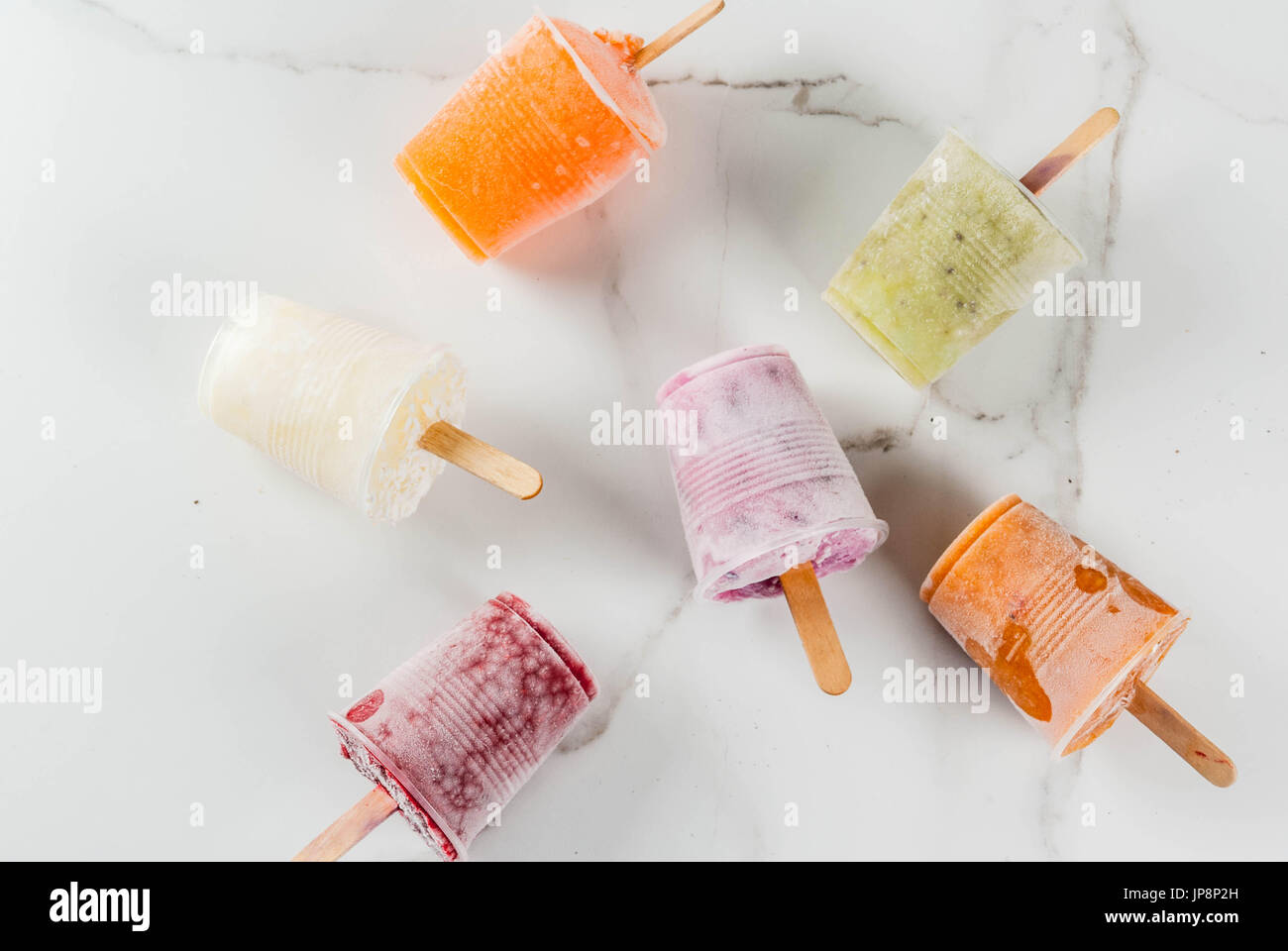 Healthy summer desserts. Ice cream popsicles. Frozen tropical juices ...