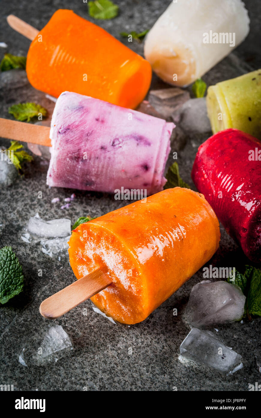 Healthy summer desserts. Ice cream popsicles. Frozen tropical juices ...