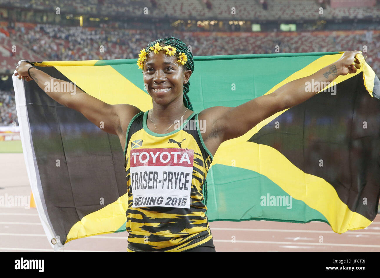 Jamaican sprinter Shelly-Ann Fraser-Pryce celebrates after winning the ...