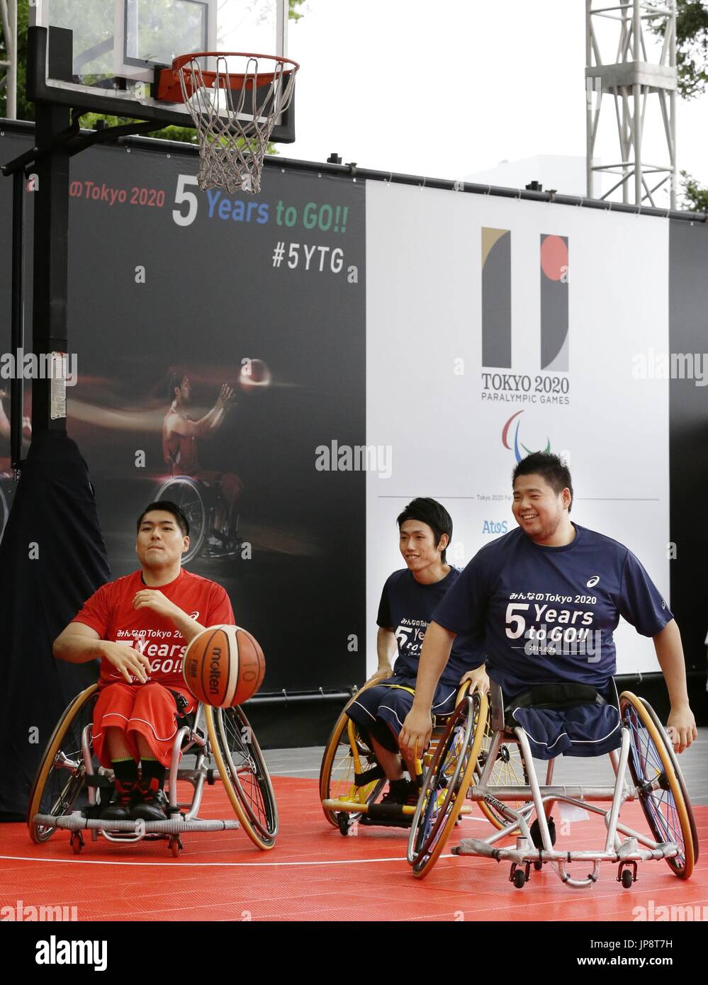 Japanese wheelchair basketball players participate in an event in Tokyo ...