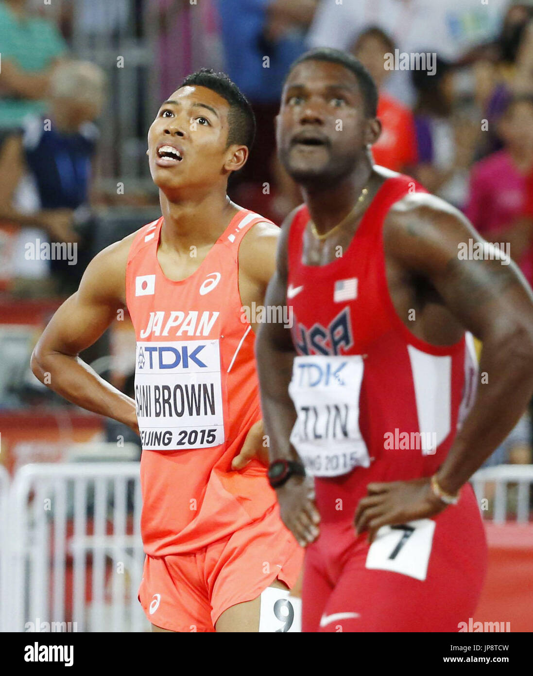 Japanese teenager Hakim Sani Brown (L) and Justin Gatlin of the United ...