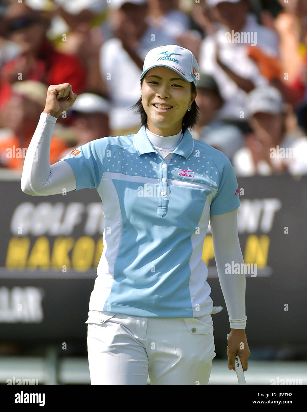 Japan's Mayu Hattori reacts after parring the final hole for a 69 to clinch the CAT Ladies Golf ...