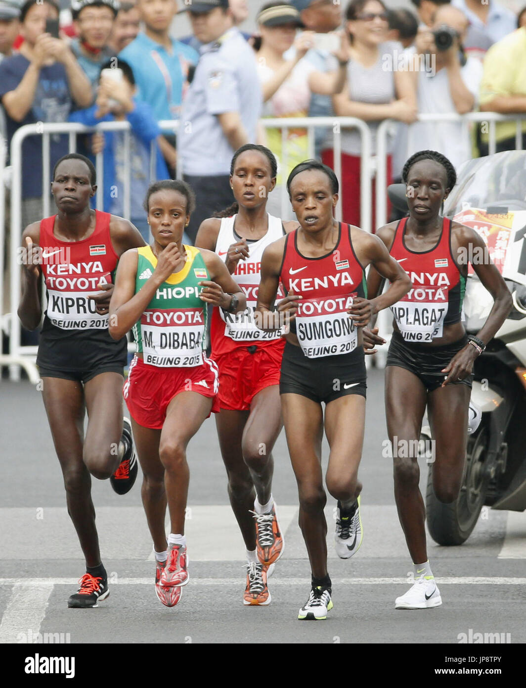 Mare Dibaba of Ethiopia (2nd from L), Edna Ngeringwony Kiplagat of ...