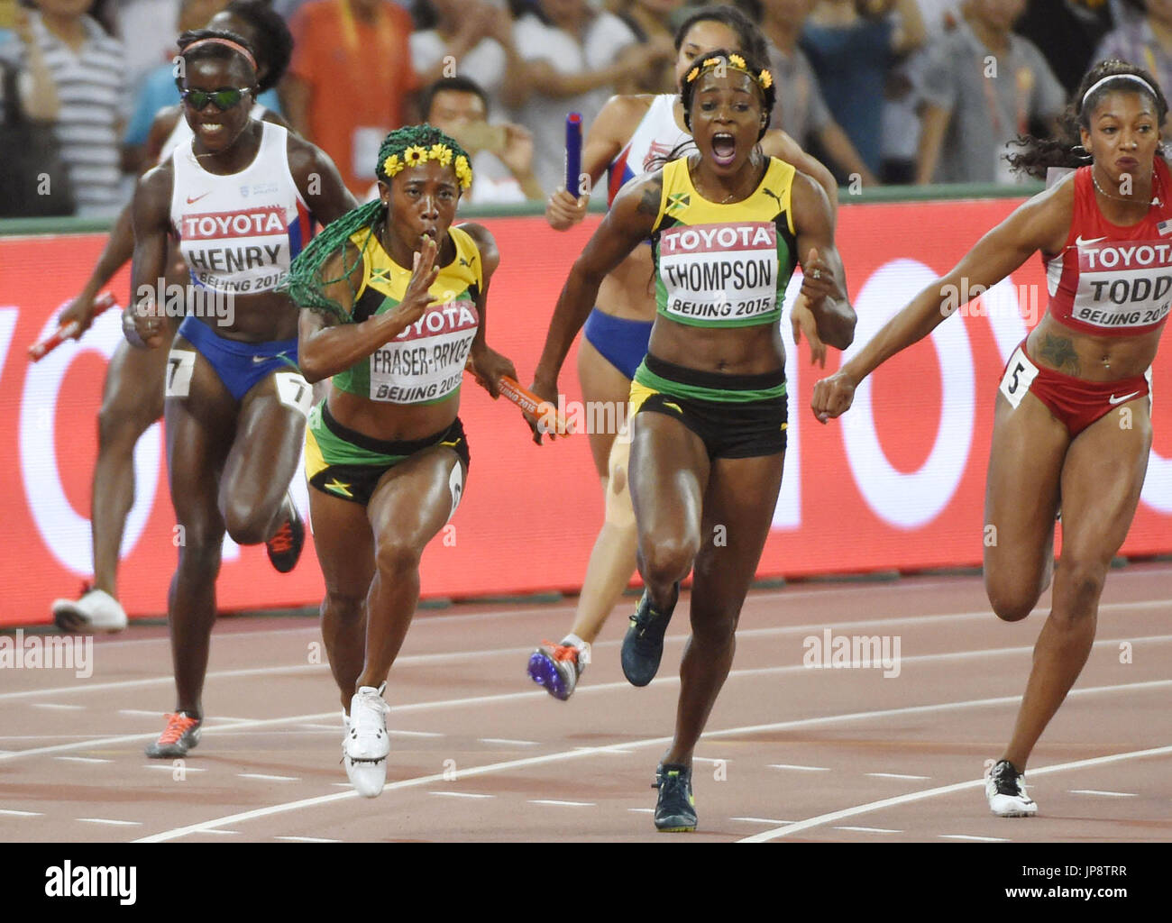 Jamaica's Shelly-Ann Fraser-Pryce (2nd from R) anchors her team in the women's 4x100 meter relay ...