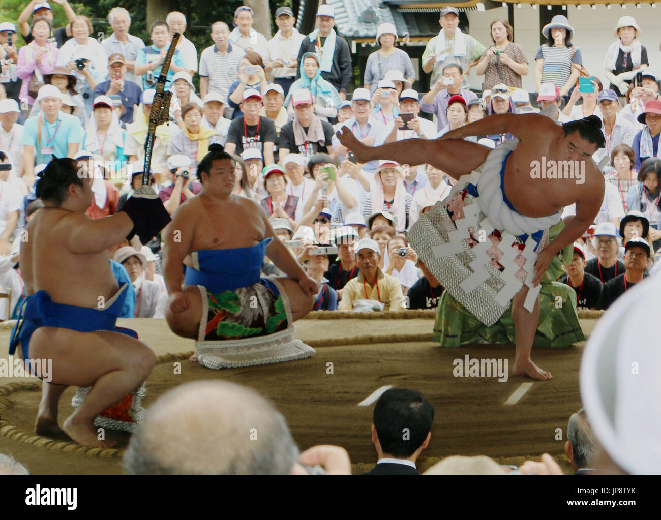 Yokozuna Harumafuji performs a ring-entering ceremony at a shrine in ...