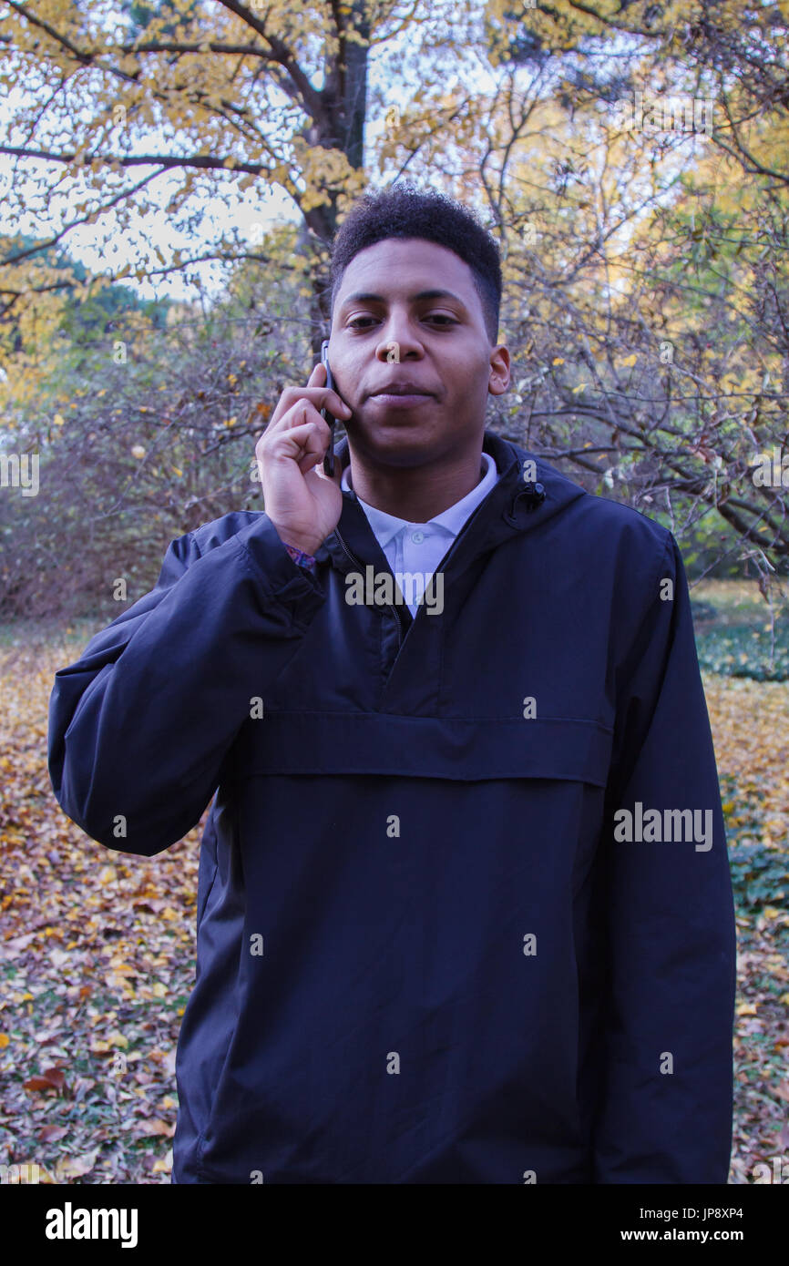 Young black man talking hi-res stock photography and images - Alamy