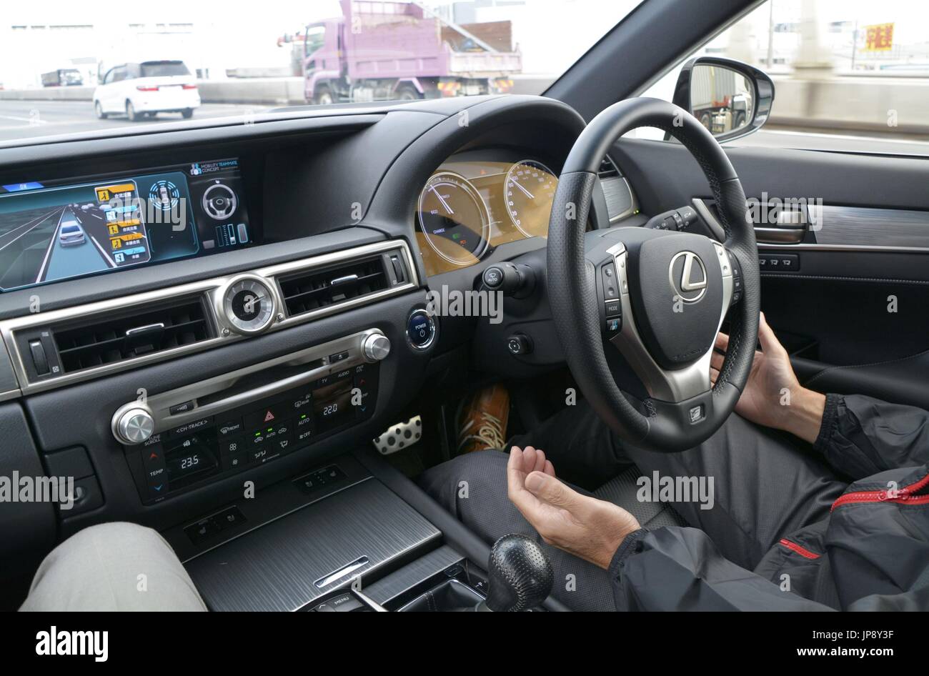 Toyota Motor Corp.'s automated highway-driving vehicle is shown to the ...