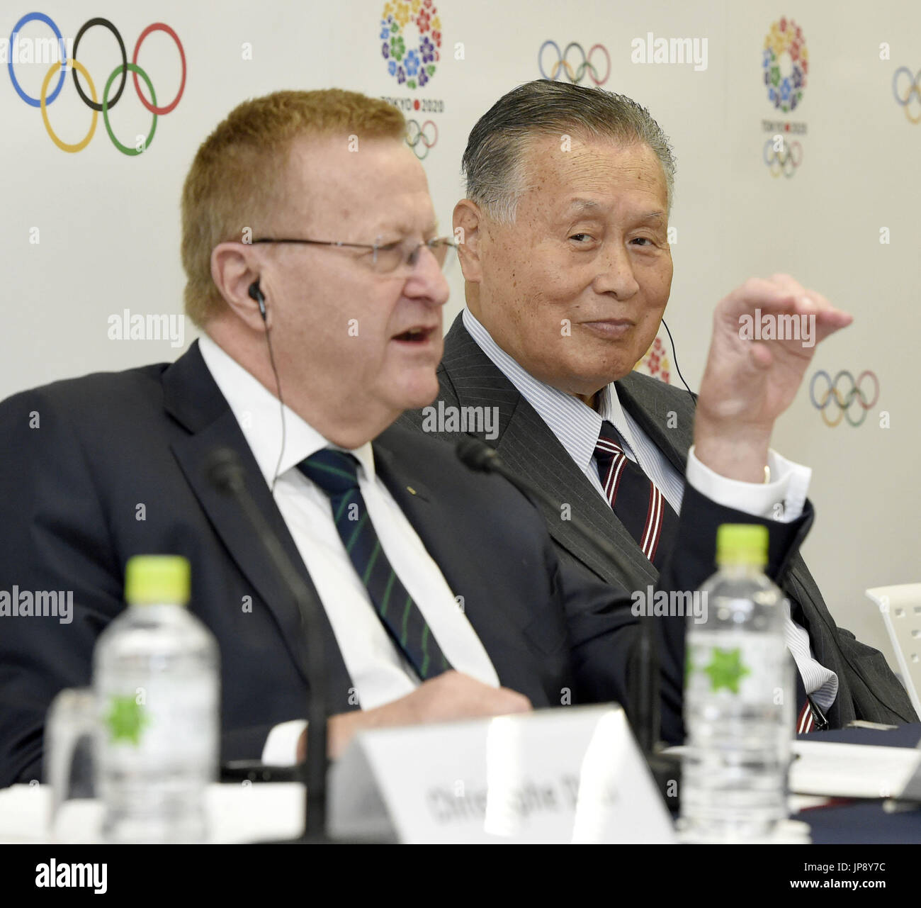 John Coates (L), chairman of the International Olympic Committee's ...