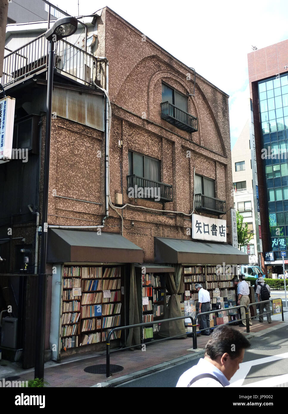 A secondhand bookstore in Tokyo's Jinbocho area has shelves of books ...