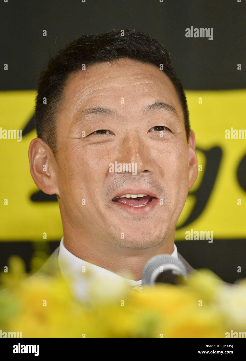 Hanshin Tigers' new manager Tomoaki Kanemoto attends a press conference in Osaka on Oct. 19 ...