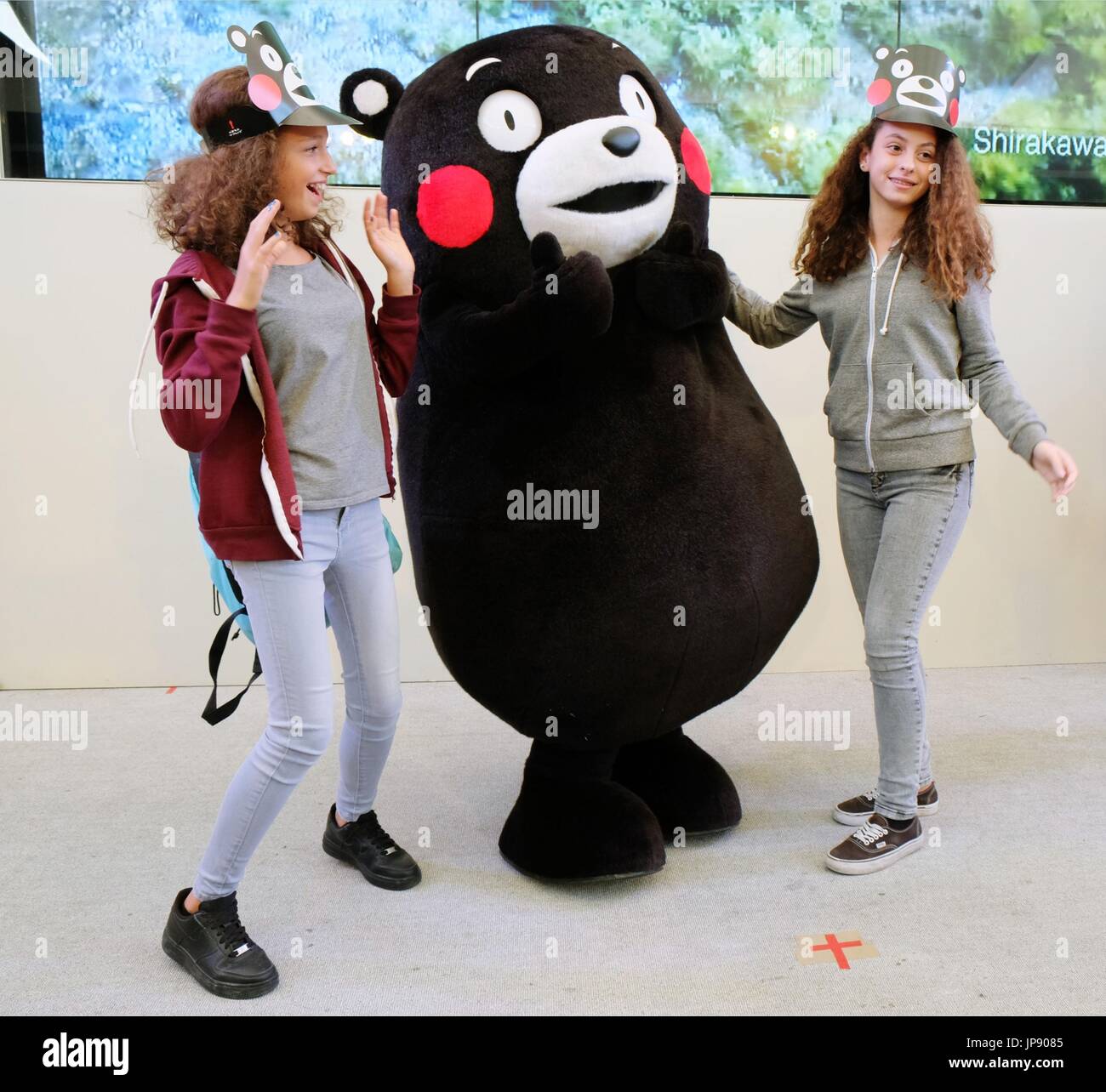 Visitors to the Japan Pavilion at the world exposition in Milan pose ...