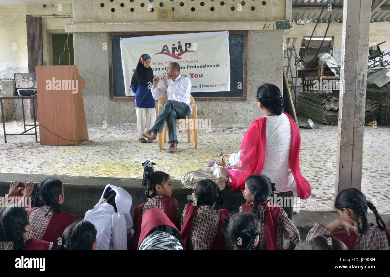 Syed Najeeb Ur Rahman (R, back), a cofounder of the Association of ...