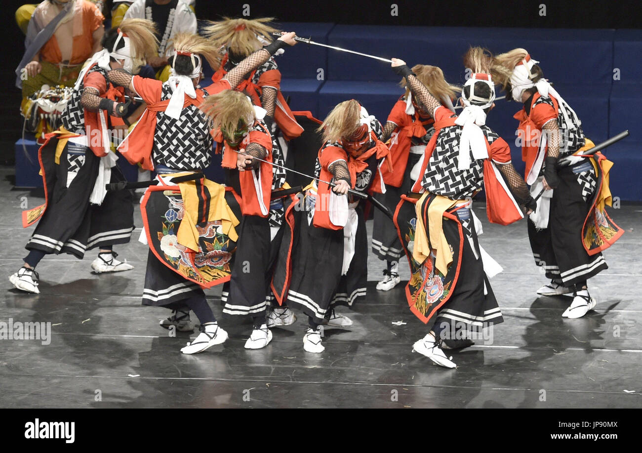 Dancers perform a folk dance from Iwate Prefecture, northeastern Japan ...