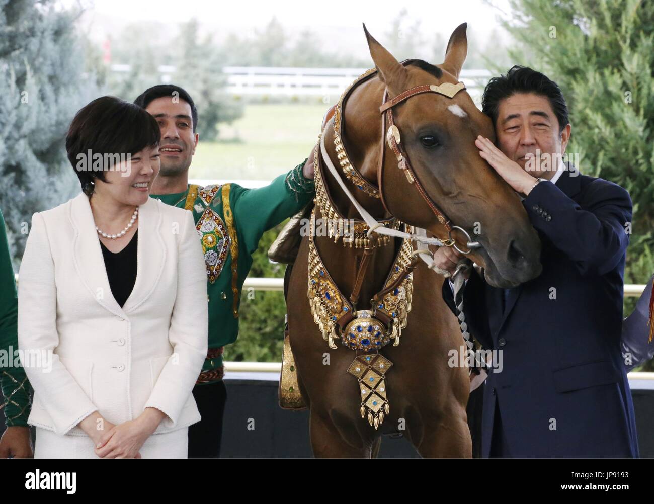 Japanese Prime Minister Shinzo Abe (R) and his wife Akie pose for ...
