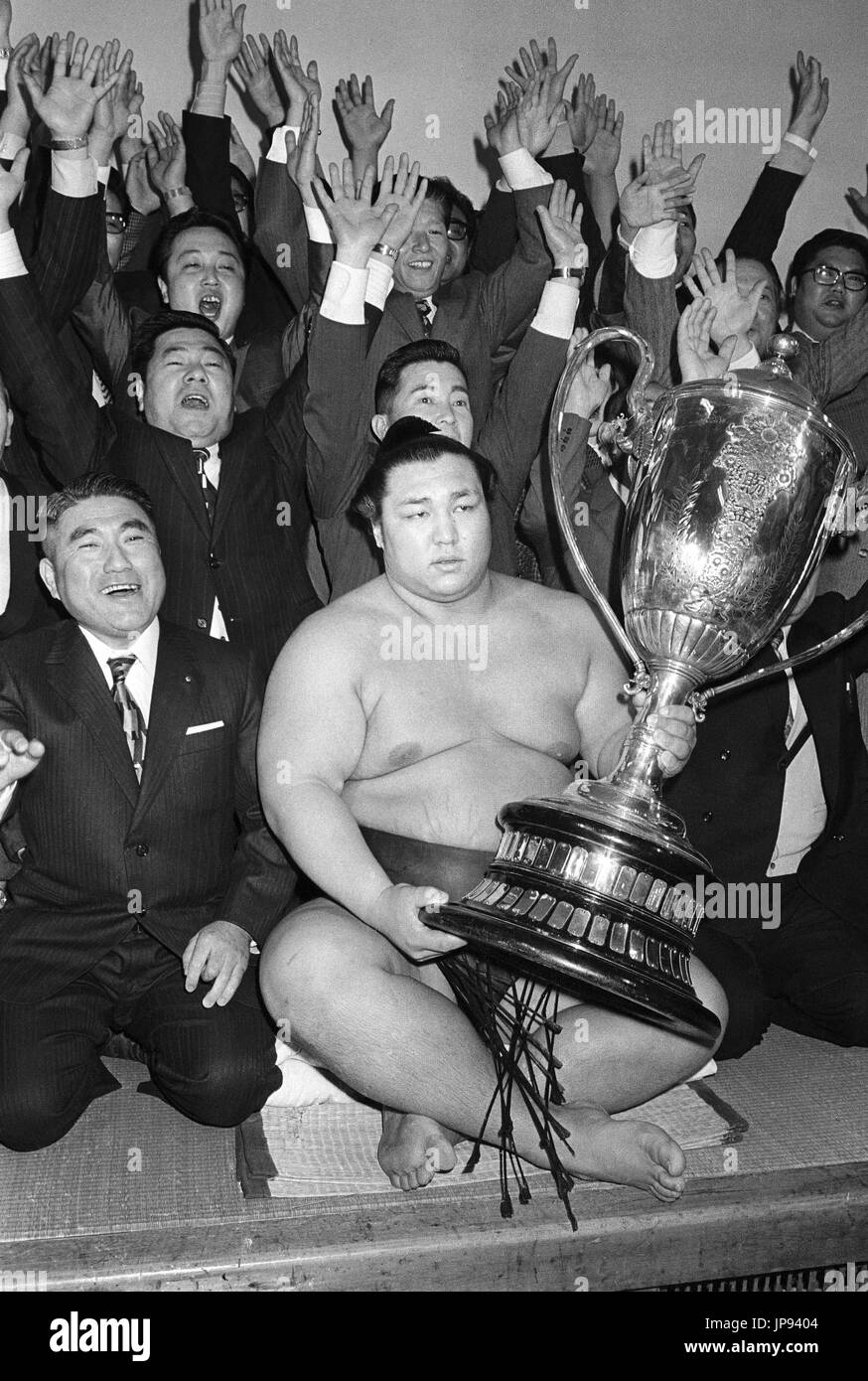 Sekiwake Kitanoumi holds his trophy at Kuramae Kokugikan in Tokyo after ...