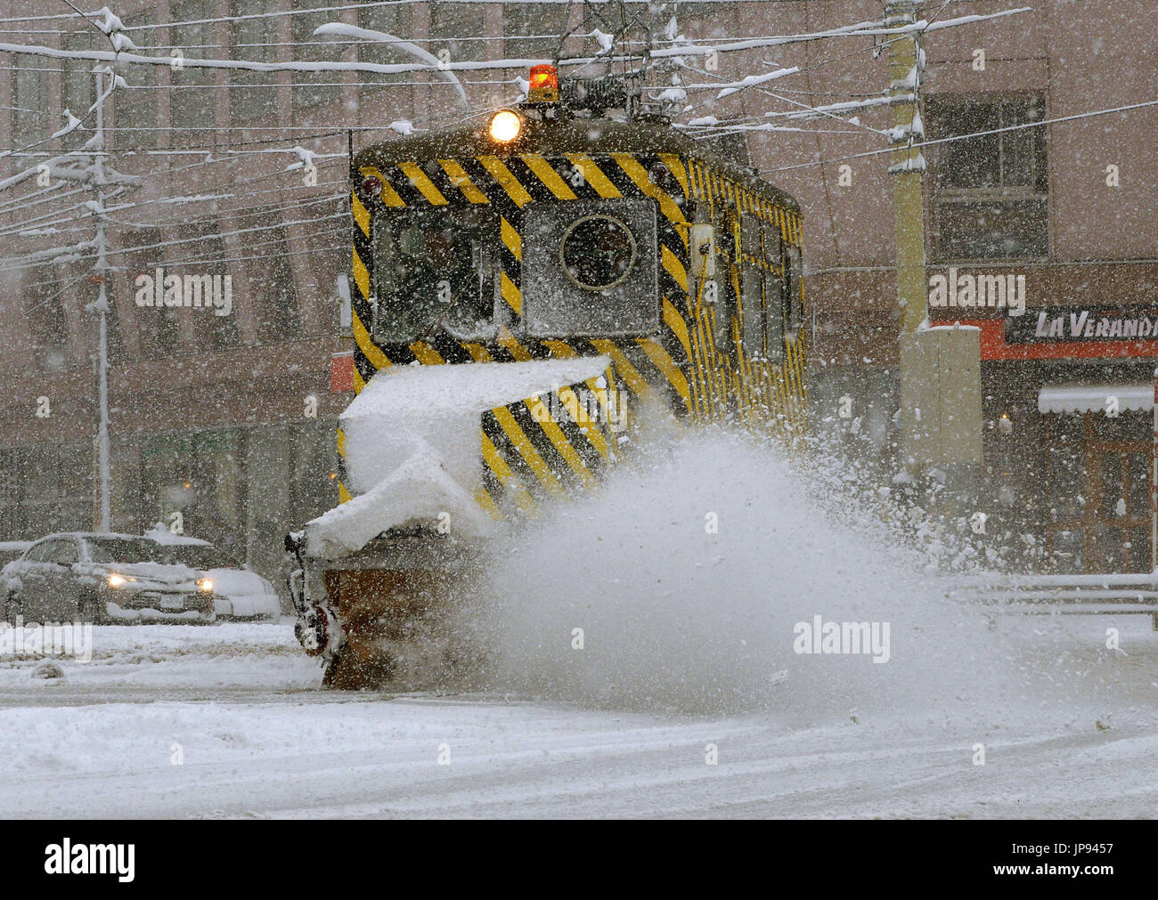 Photo shows a snow removal tram, known as "Sasara Tram," making its ...