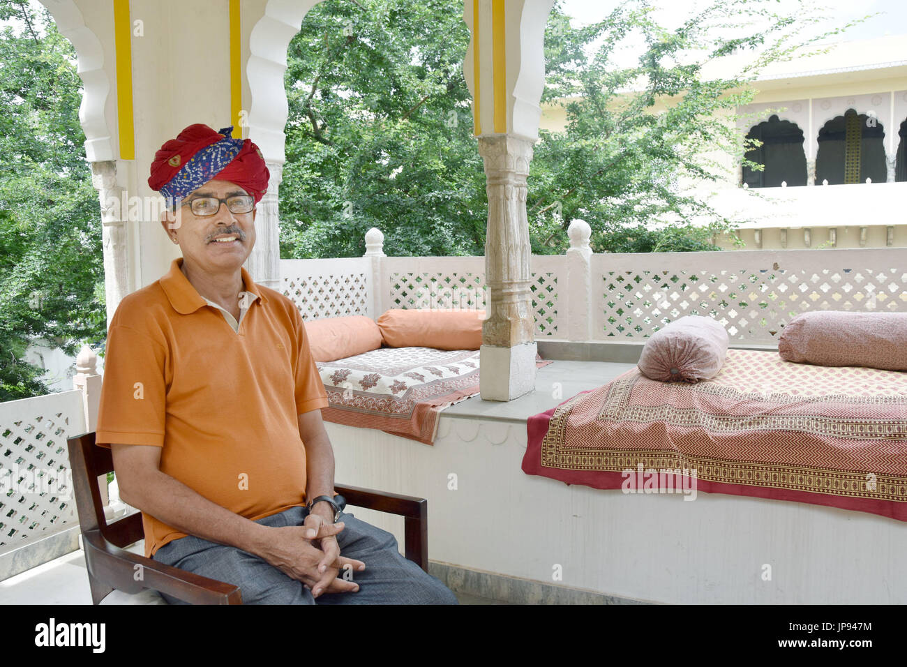 Durga Singh sits at a tea lounge in his hotel Dera Mandawa, renovated from the terrace of his ...