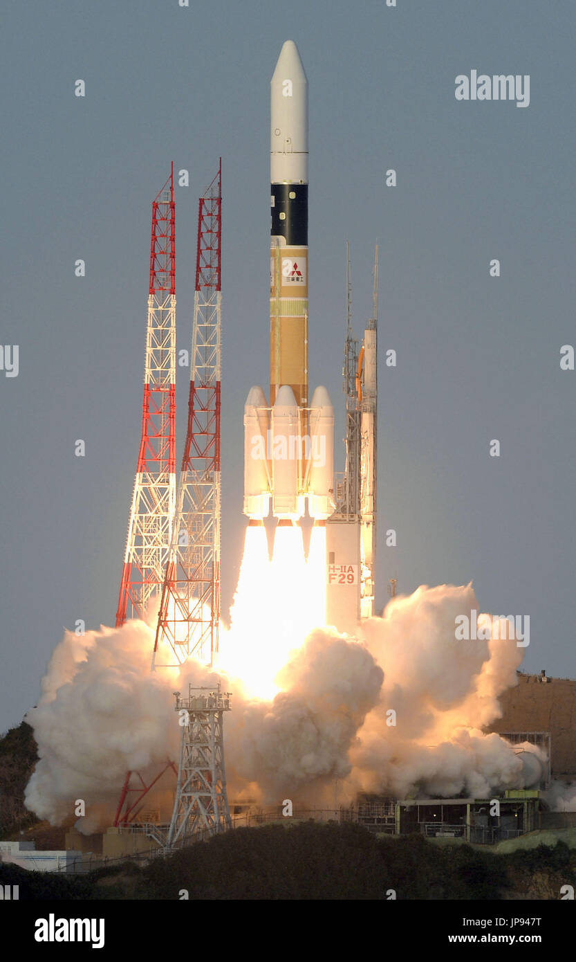 An H-2A rocket carrying a Canadian communications satellite lifts off ...