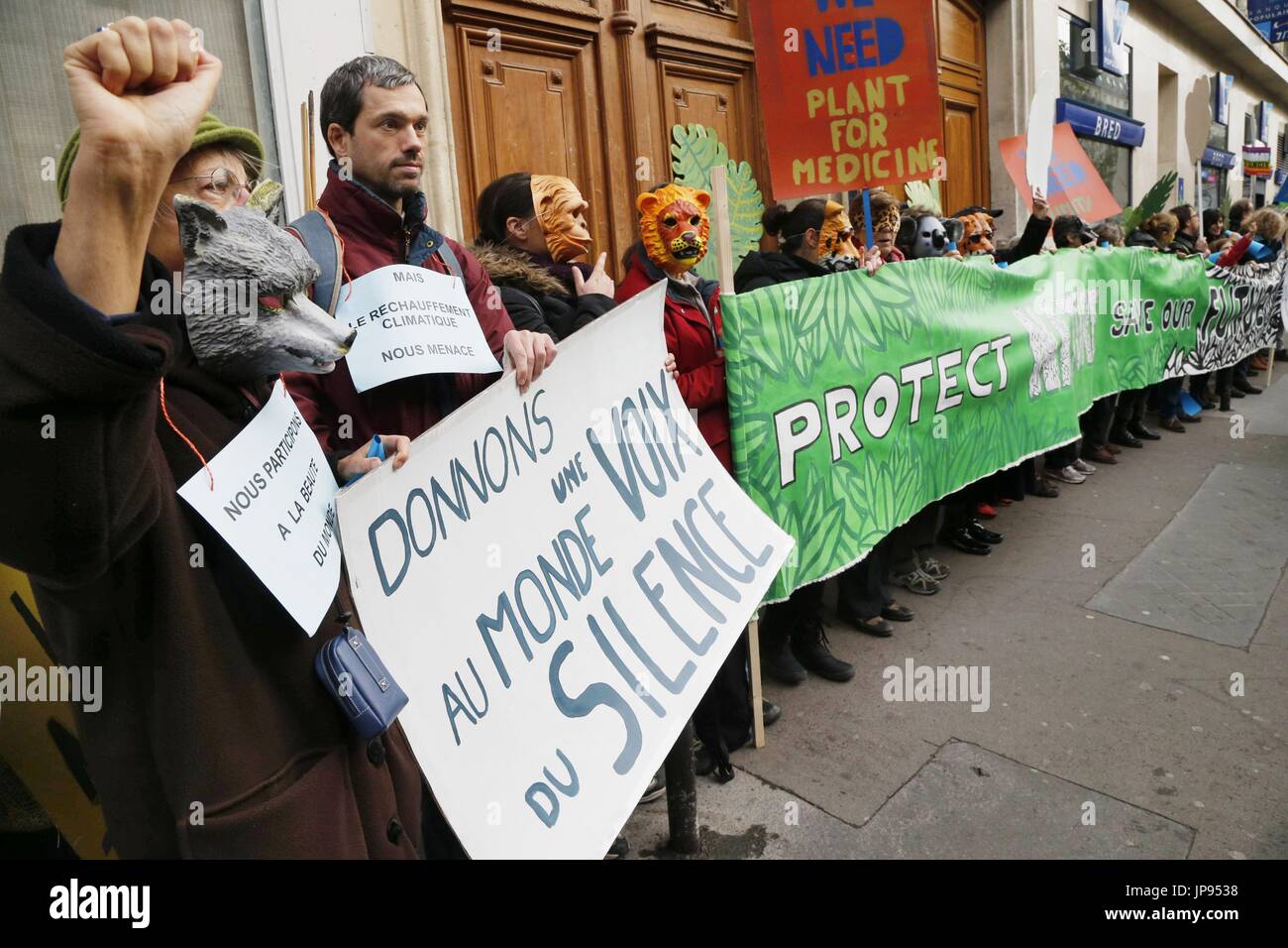 Activists hold up banners calling for protection of the environment in ...