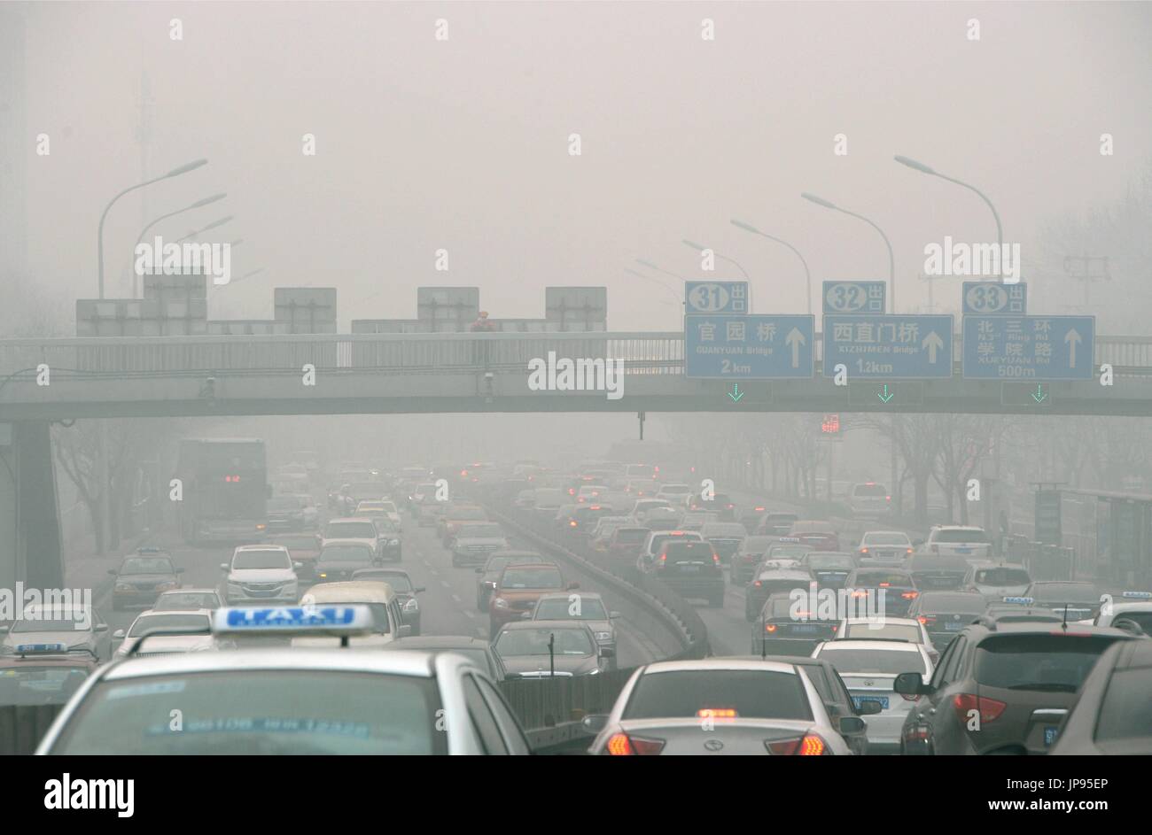 An expressway looks hazy amid the smog in Beijing on Nov. 30, 2015, as ...